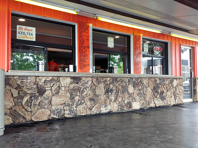 The service windows &ndash; where culinary dreams are ordered, assembled, and passed through with the efficiency of a well-oiled machine.