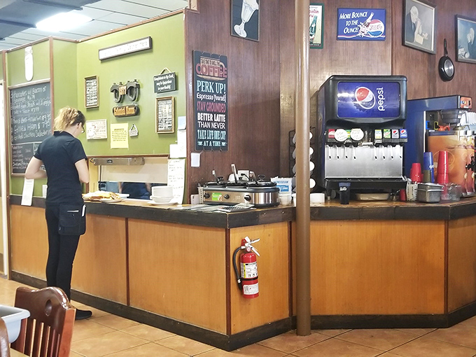 The counter where breakfast dreams come true, staffed by folks who've probably called someone "hon" at least twelve times before noon.