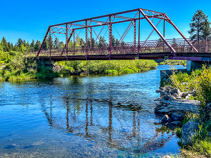 This rustic bridge spans more than just water&mdash;it connects you to Idaho's wilder side. Reflections double the beauty in this peaceful scene.
