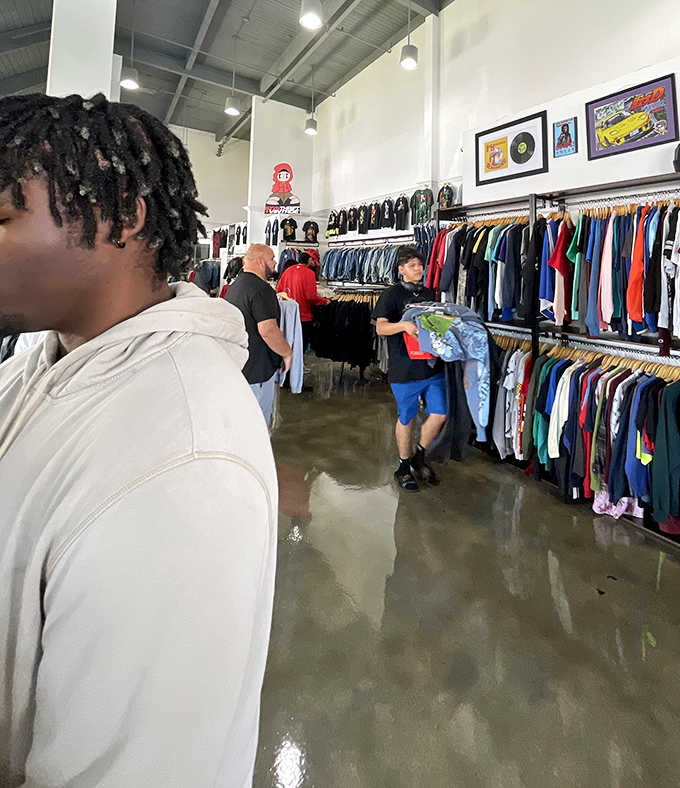 The thrill of the hunt in action &ndash; shoppers experiencing that unique joy that comes only from uncovering someone else's fashion castoffs.