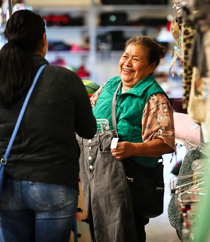 The joy of thrift store discovery transcends age and background. These shoppers know the universal thrill of finding that perfect something.
