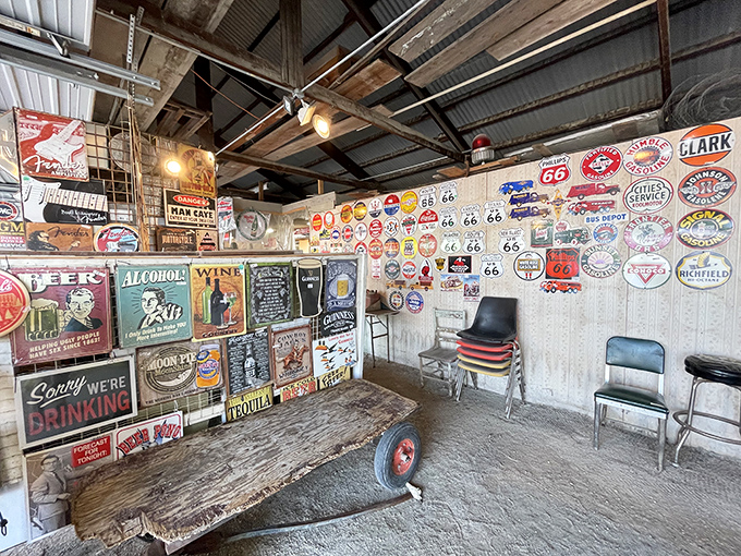 A wall of vintage advertising signs offers a colorful trip down memory lane, each tin rectangle a portal to America's commercial past.