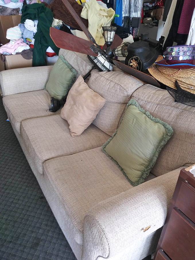 This beige sofa has witnessed more family moments than a photo album, ready for new memories.