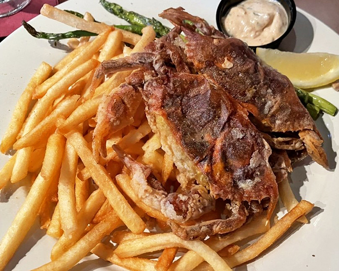 Soft shell crab that's crispy, delicate, and served with fries so golden they deserve their own Swiss bank account.