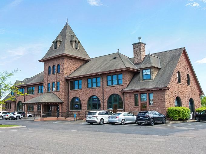 The Soo Line Depot stands as a magnificent reminder of when train travel was the height of sophistication and brownstone was the material of choice.