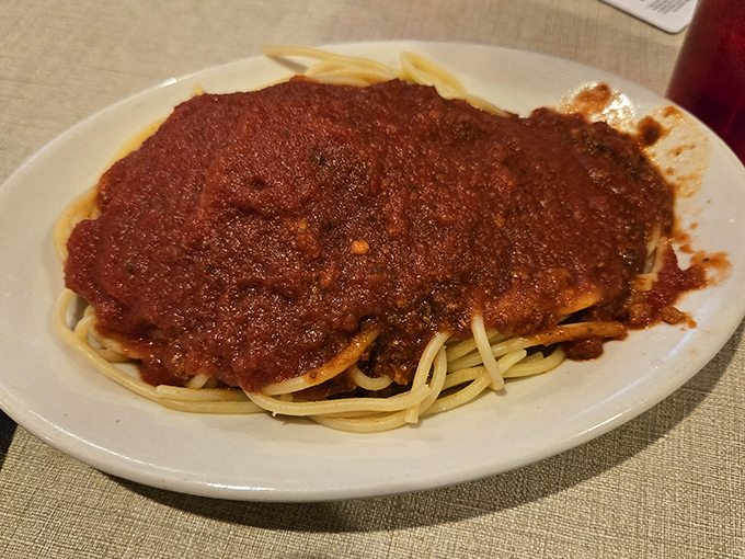 Spaghetti with meat sauce—the dish against which all Italian-American restaurants must be judged. This plate passes the test with flying, tomato-red colors.