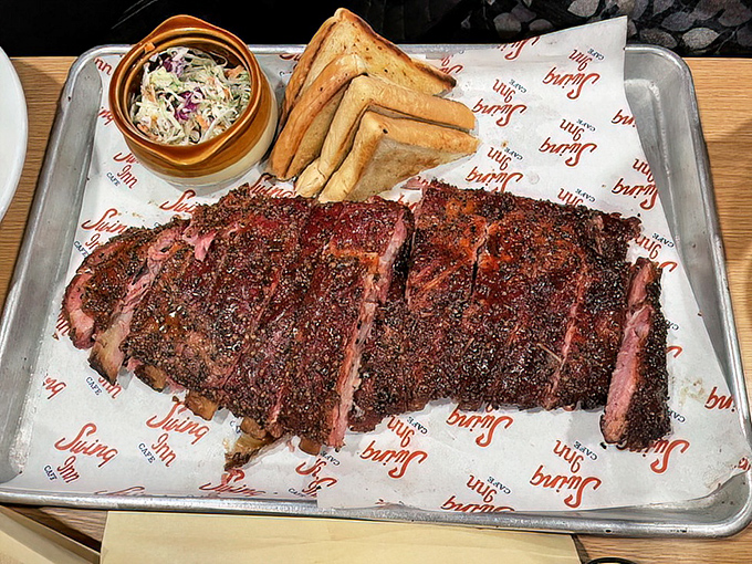 BBQ artistry that would make a carnivore weep &ndash; these ribs have clearly been on a slow, smoky journey to reach your eager fork.