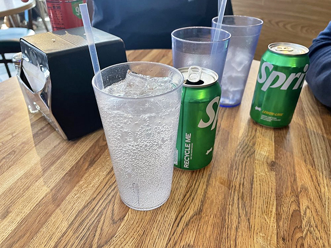 The universal sign of a proper diner experience: condensation-beaded glasses and cans of soda that somehow taste better here than anywhere else.