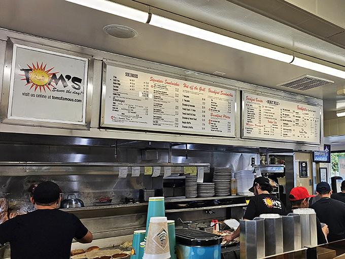 Where the magic happens. The open kitchen design means you can watch your breakfast dreams become reality as skilled hands work the grill.