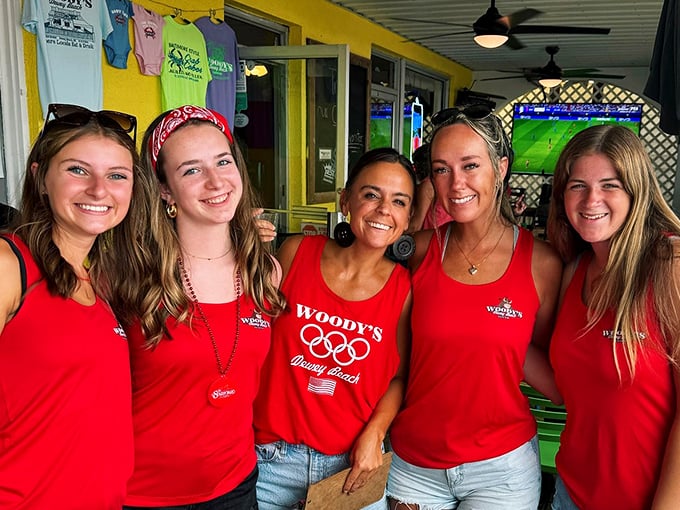Woody's staff&mdash;the red-shirted ambassadors of seafood joy&mdash;bringing Delaware beach hospitality to life with every plate served.