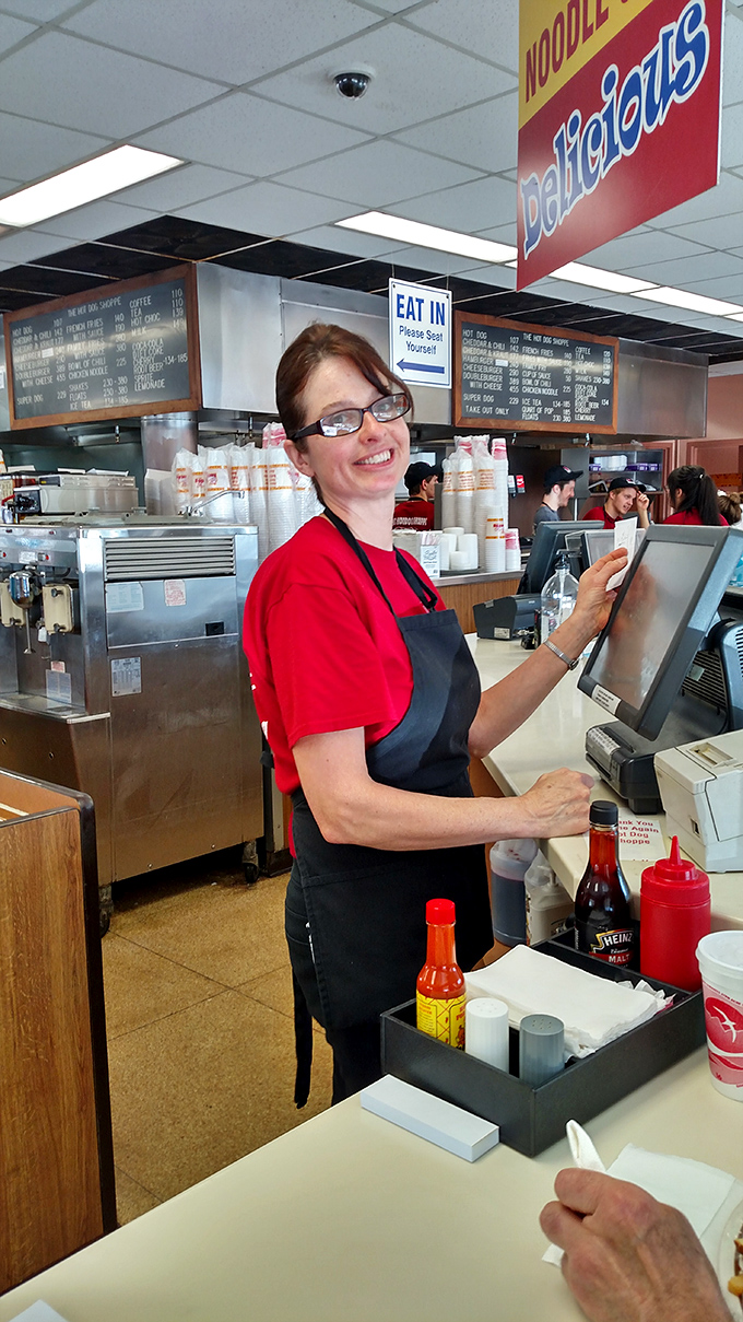 The staff moves with the efficiency of people who've turned hot dog assembly into an art form, wearing smiles as genuine as the food they serve.