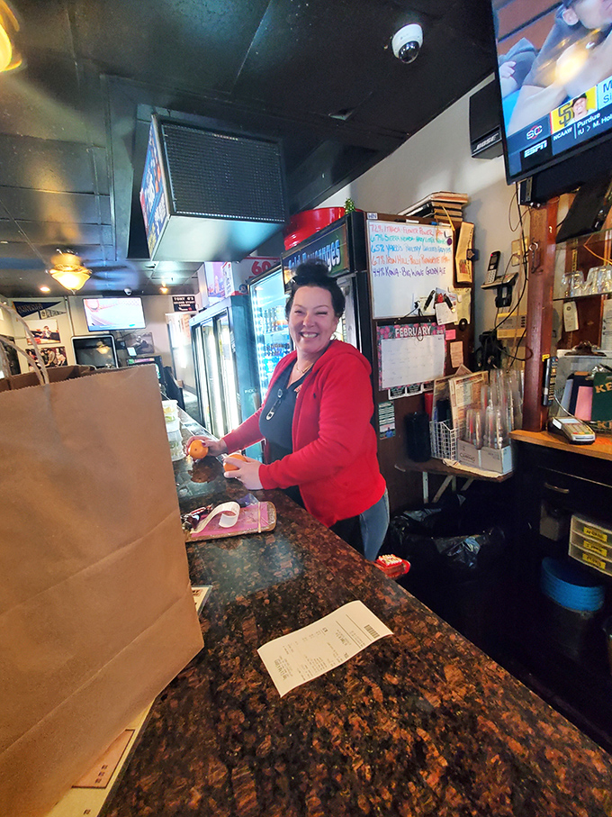 Behind the scenes where sandwich magic happens. The staff's smile says it all&mdash;they know they're creating memories, not just meals.