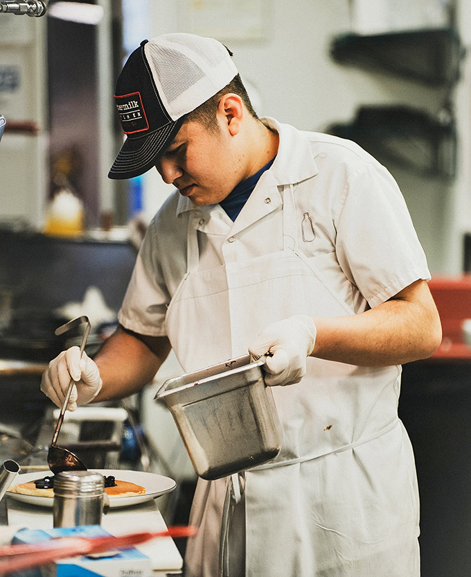 Culinary craftsmanship in action. Behind every perfect waffle is someone who takes breakfast very, very seriously.