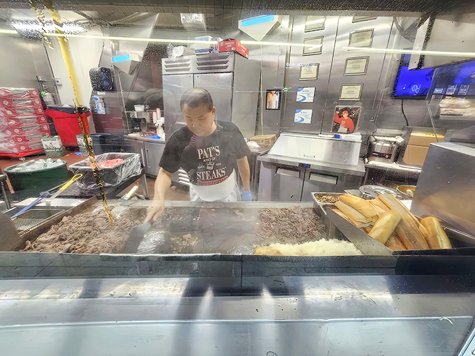 Watching the maestro at work is half the experience. Those hands have probably made more cheesesteaks than you've had hot dinners.