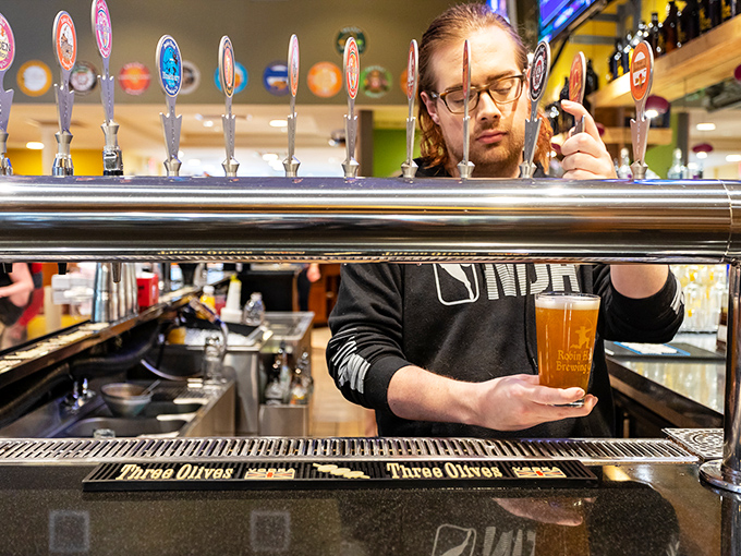 Behind every great beer is a dedicated craftsperson, measuring and pouring liquid happiness one glass at a time.