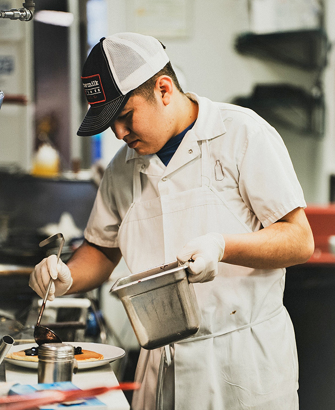 Behind every perfect plate is a focused chef, orchestrating breakfast symphonies with the precision of a conductor and the soul of a poet.