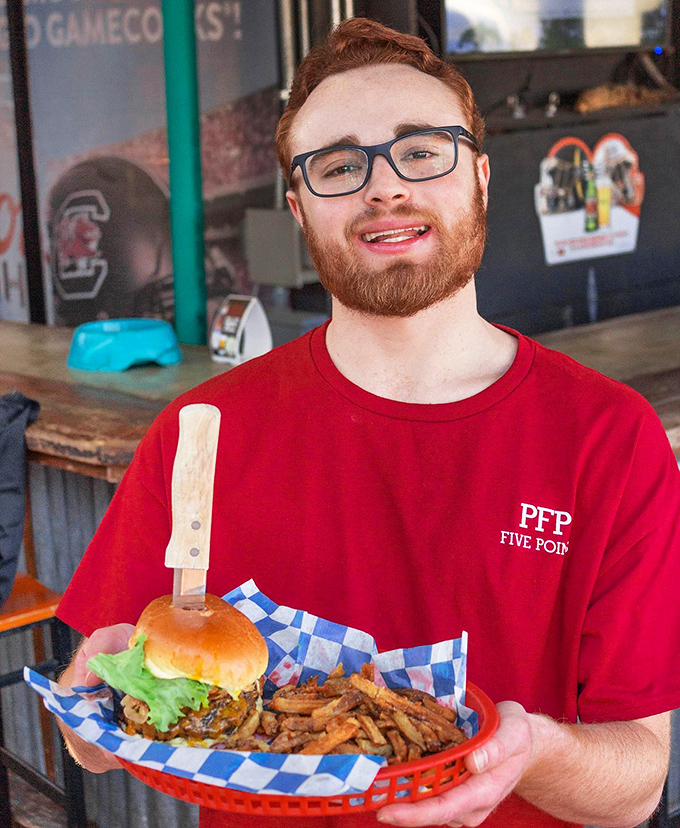 That smile says it all&mdash;when your job is delivering happiness on a plate, it's hard not to share in the joy.