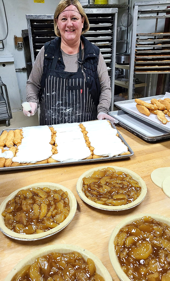 Behind every great pastry is a skilled baker. Here, apple pies in various stages of creation showcase the artistry that goes into each Achenbach's offering.