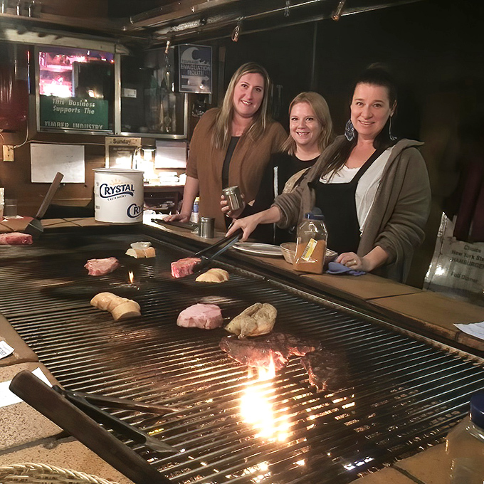 The communal grill brings strangers together in a primal ritual of fire and meat &ndash; it's dinner and entertainment rolled into one sizzling package.