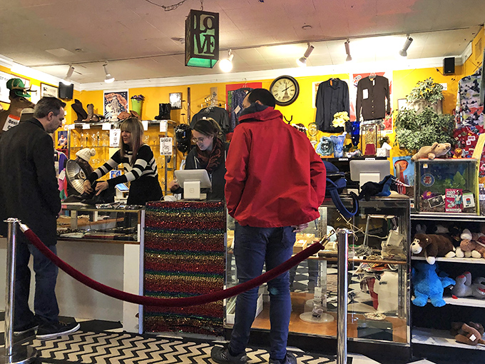 The checkout area buzzes with energy as friendly staff share in the excitement of each customer's unique discoveries.