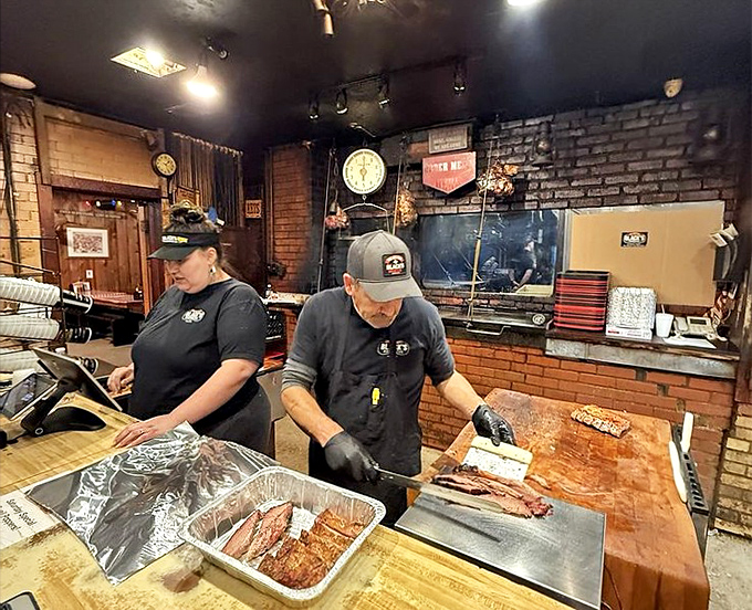 The pitmasters at work&mdash;watching them slice is like seeing Michelangelo with a chisel, except their masterpieces disappear within minutes.