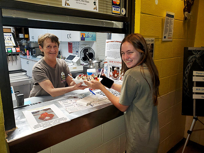 The friendly service window connects hungry customers with staff who genuinely care about your happiness.