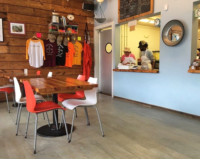 The interior balances nautical touches with clean simplicity, where even the merchandise hanging on wooden walls feels like part of the experience.