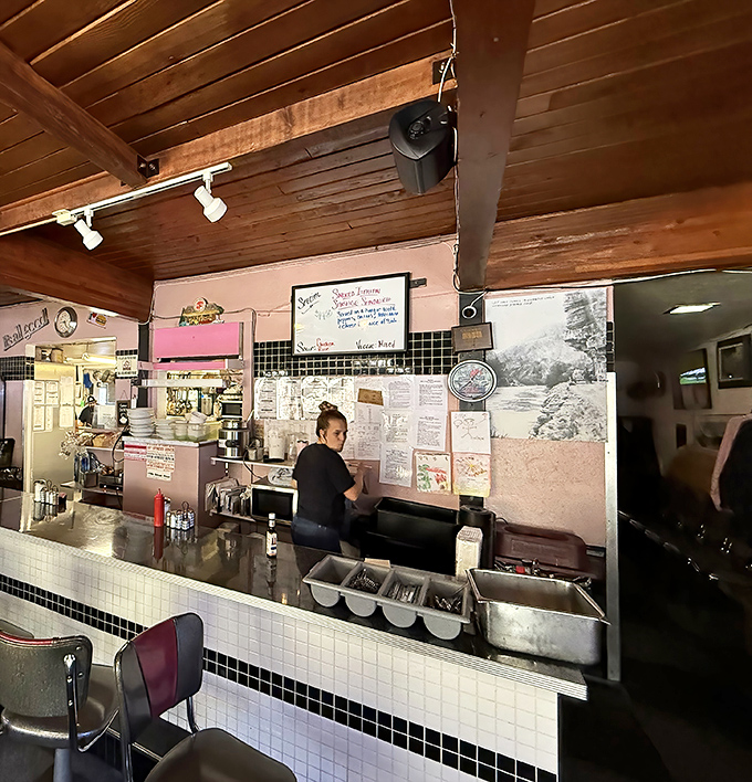 Where the magic happens. The pass-through window offers a glimpse into the choreographed chaos of diner cooking.