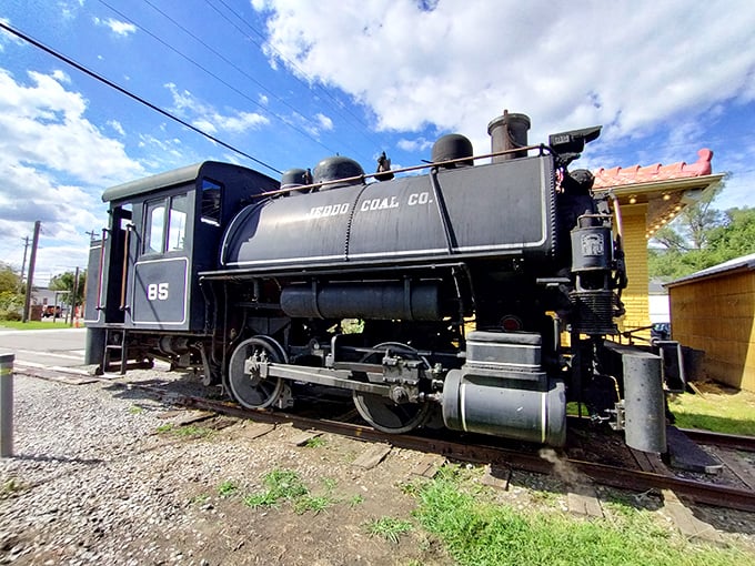 This beautifully preserved steam locomotive stands as a monument to American industrial ingenuity &ndash; its imposing black silhouette a reminder of coal-powered journeys past.
