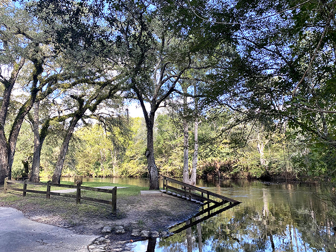 A peaceful riverside park where the water's gentle flow matches the town's unhurried pace &ndash; nature's meditation space, no app required. 