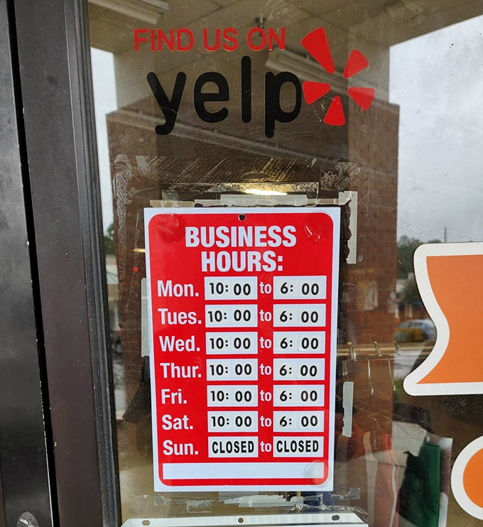 The hours posted clearly, because treasure hunting requires proper planning. Mark your calendars&mdash;Sunday is for resting, not thrifting.