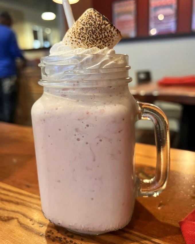This isn't just a milkshake &ndash; it's dessert architecture, complete with a toasted marshmallow hat that's begging to be Instagrammed.