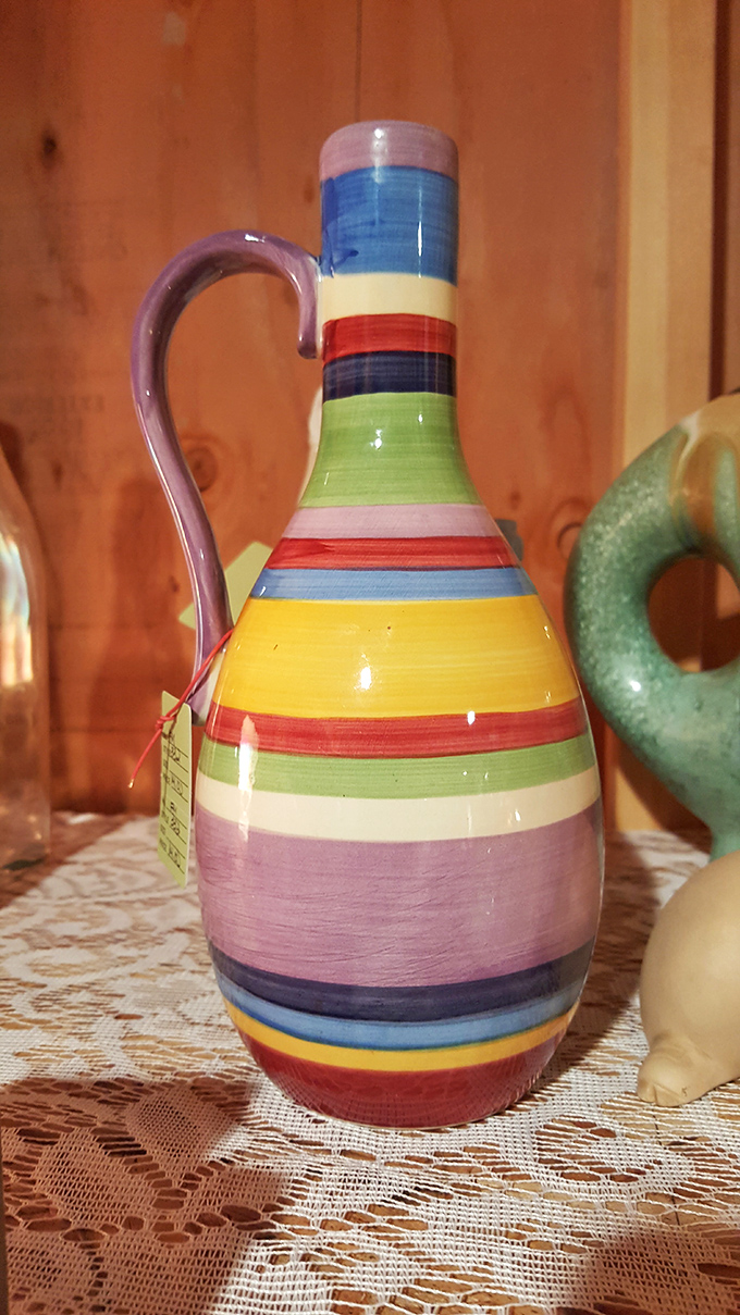 A rainbow captured in ceramic form. This striped pitcher begs to be filled with lemonade and placed center stage at your next porch gathering.
