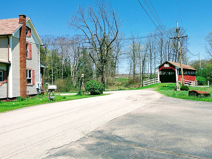 Country charm personified! This nearby home and the distant bridge create a quintessential rural Pennsylvania tableau that Norman Rockwell would have loved.