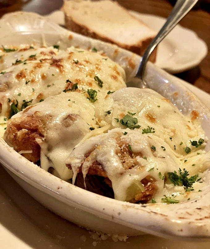 These aren't just stuffed mushrooms; they're little boats of joy sailing on seas of melted cheese toward your happy taste buds.