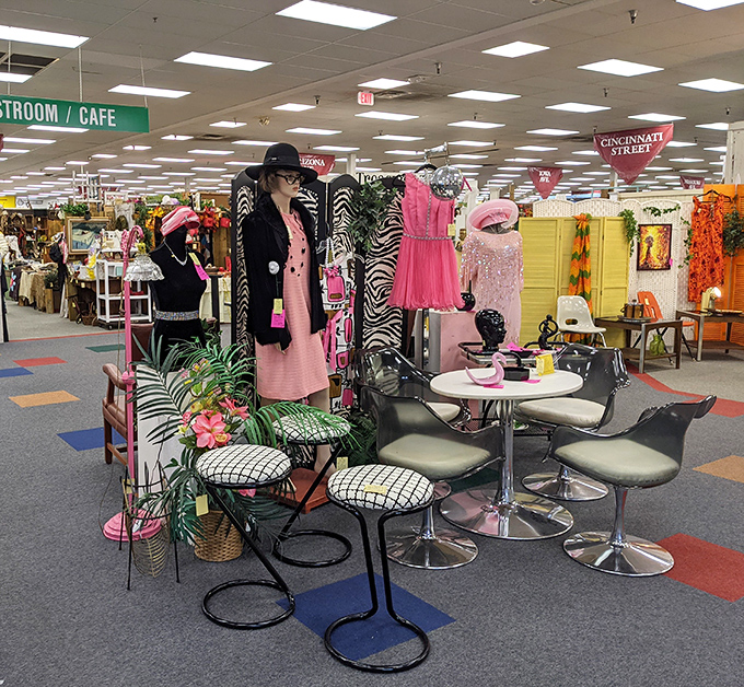 Pink retro paradise! This booth's curated collection of fashion and furniture proves the 1950s never really went out of style.