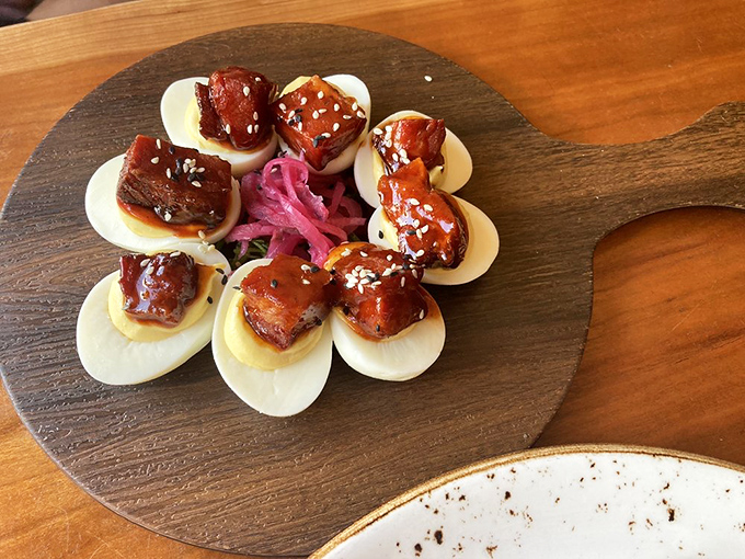 Deviled eggs that got all dressed up for the party. That pork belly topping is the culinary equivalent of a mic drop.