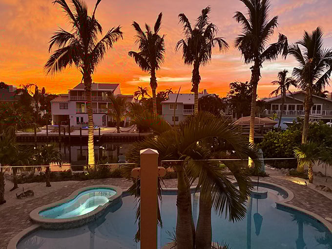 Sunset transforms the island into a golden dreamscape. Even the palm trees seem to applaud nature's nightly show.