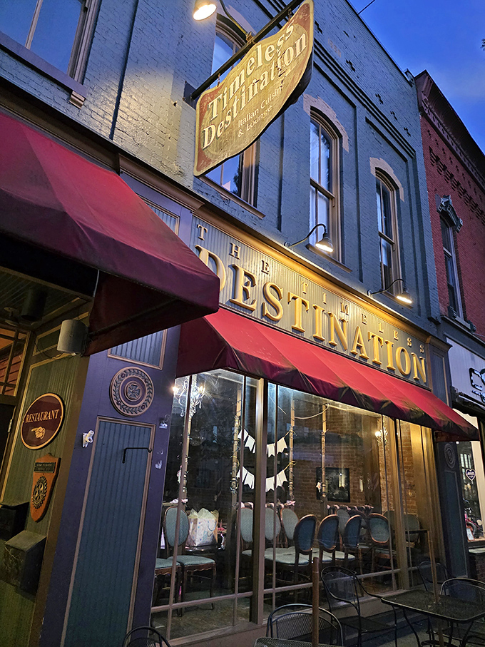 Timeless Destination glows with evening ambiance. The elegant awning and vintage signage hint at memorable meals without Manhattan prices.