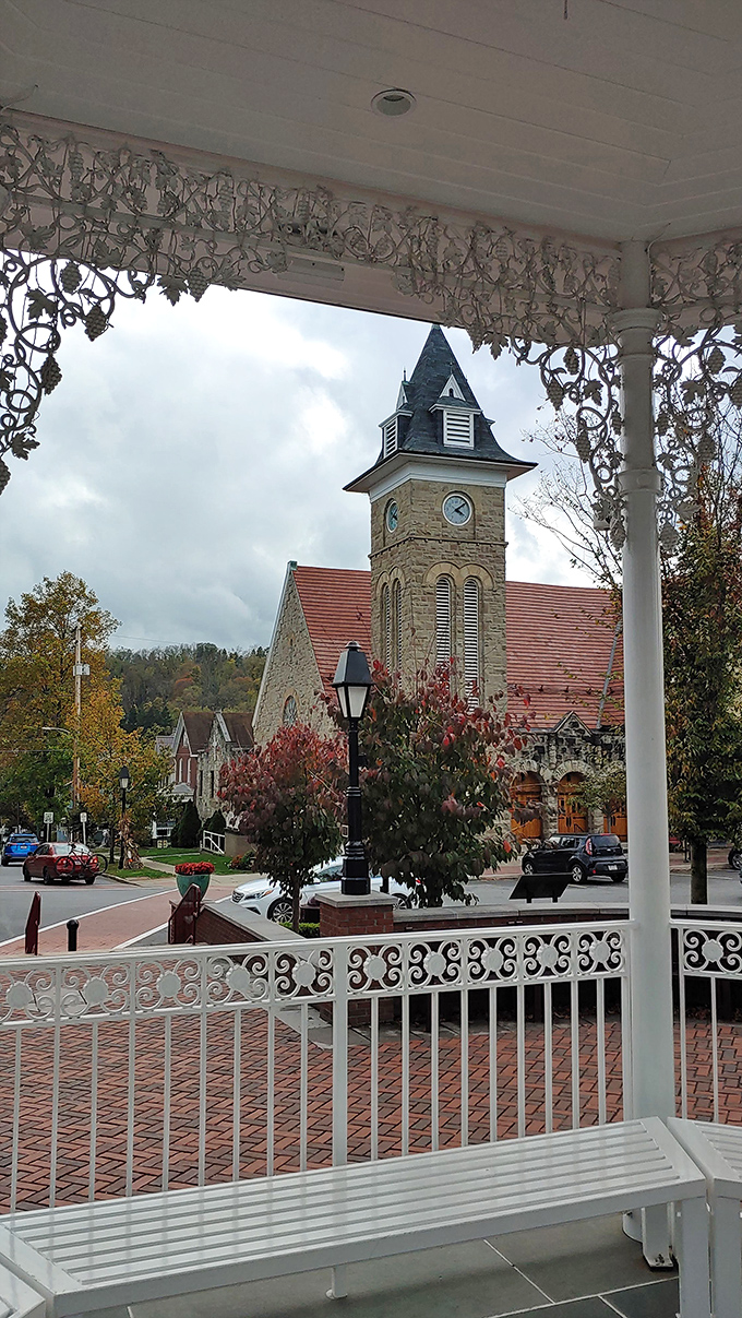 Red brick church stands sentinel, witnessing generations of Sunday services and community celebrations.