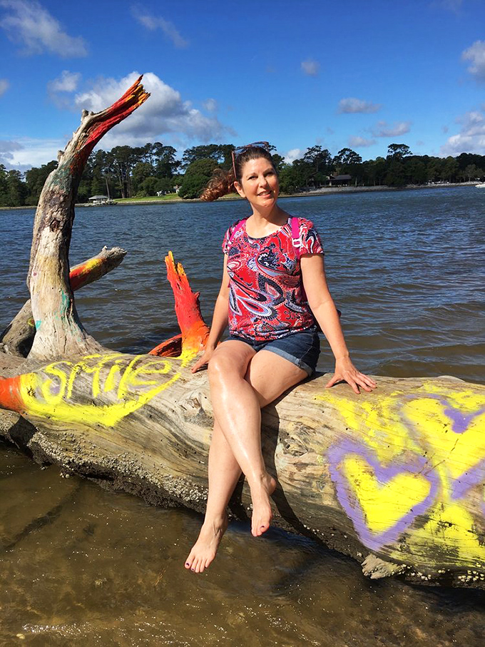 The shoreline becomes an impromptu art gallery where driftwood gets a colorful second life and visitors find the perfect contemplation perch. 