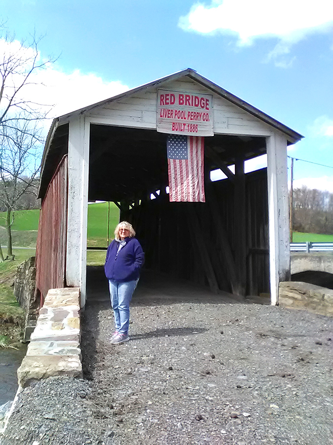 A visitor pauses to appreciate this slice of Americana—the perfect human scale against this engineering marvel from another era.