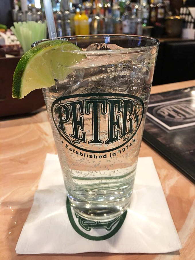 The house vodka soda, served in a glass that's seen decades of celebrations, disappointments, and first dates&mdash;with a lime wedge for good measure.