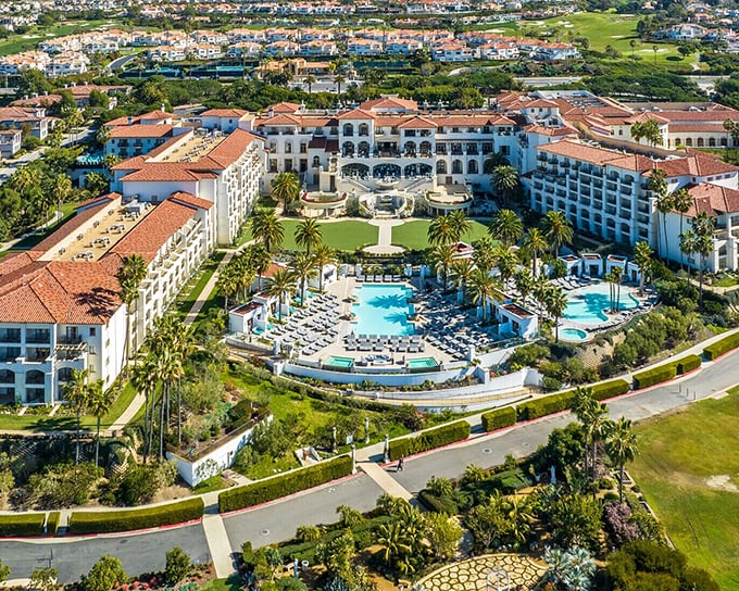 The Waldorf Astoria Monarch Beach Resort sprawls regally above the coastline, a Mediterranean palace where luxury and ocean views come standard with every stay.