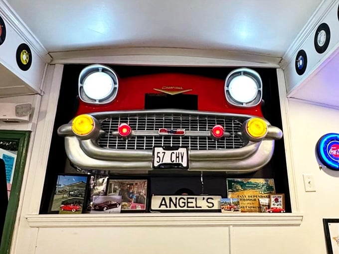 That '57 Chevy front end mounted on the wall isn't just decoration&mdash;it's watching over your meal like the patron saint of American diners.
