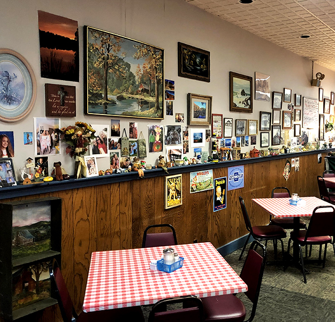 The walls showcase a gallery of memories, creating that perfect small-town diner atmosphere where every photo frame holds a story worth hearing.