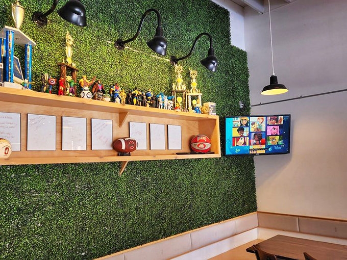The green wall display shelf showcases trophies and memorabilia&mdash;evidence that chicken domination doesn't happen by accident.