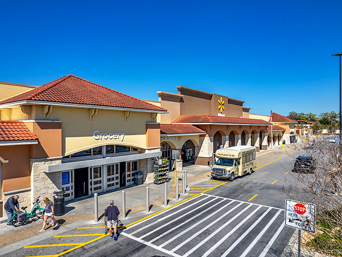 Even paradise needs groceries. This shopping center brings a touch of Mediterranean architecture to the mundane task of buying sunscreen and snacks.