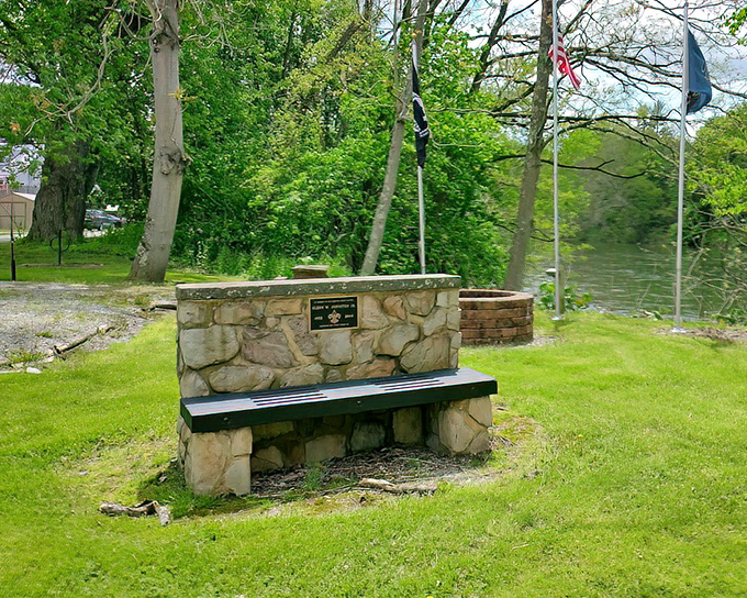 This riverside memorial bench offers a moment of contemplation with a view that beats any five-star hotel's "scenic overlook."