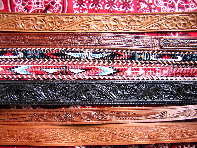 These tooled leather belts have seen more rodeos than most cowboys. Western craftsmanship that turns any outfit into a statement.